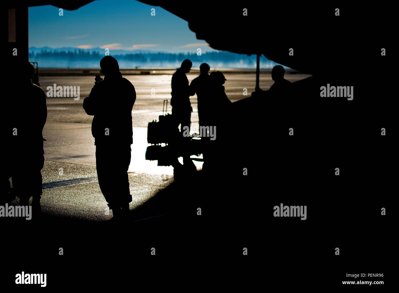 Members of the 446th Aeromedical Staging Squadron load simulated ...