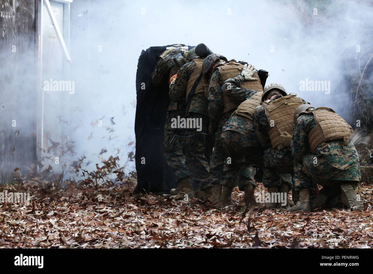 Marine Officer students with the Marine Corps Engineer School use a ...