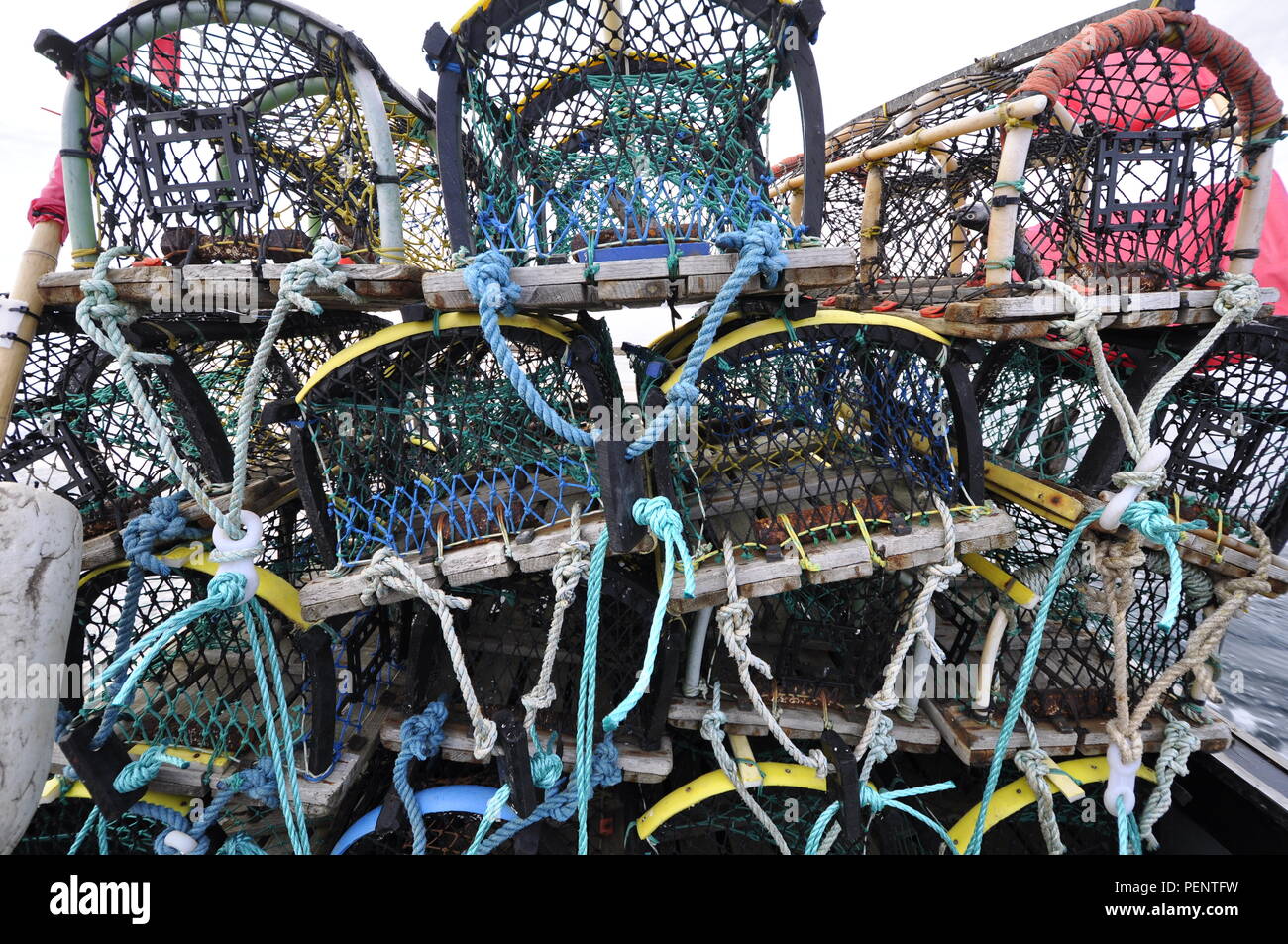 Lobster pots on an inshore fishing boat, North Sea, England UK Stock ...
