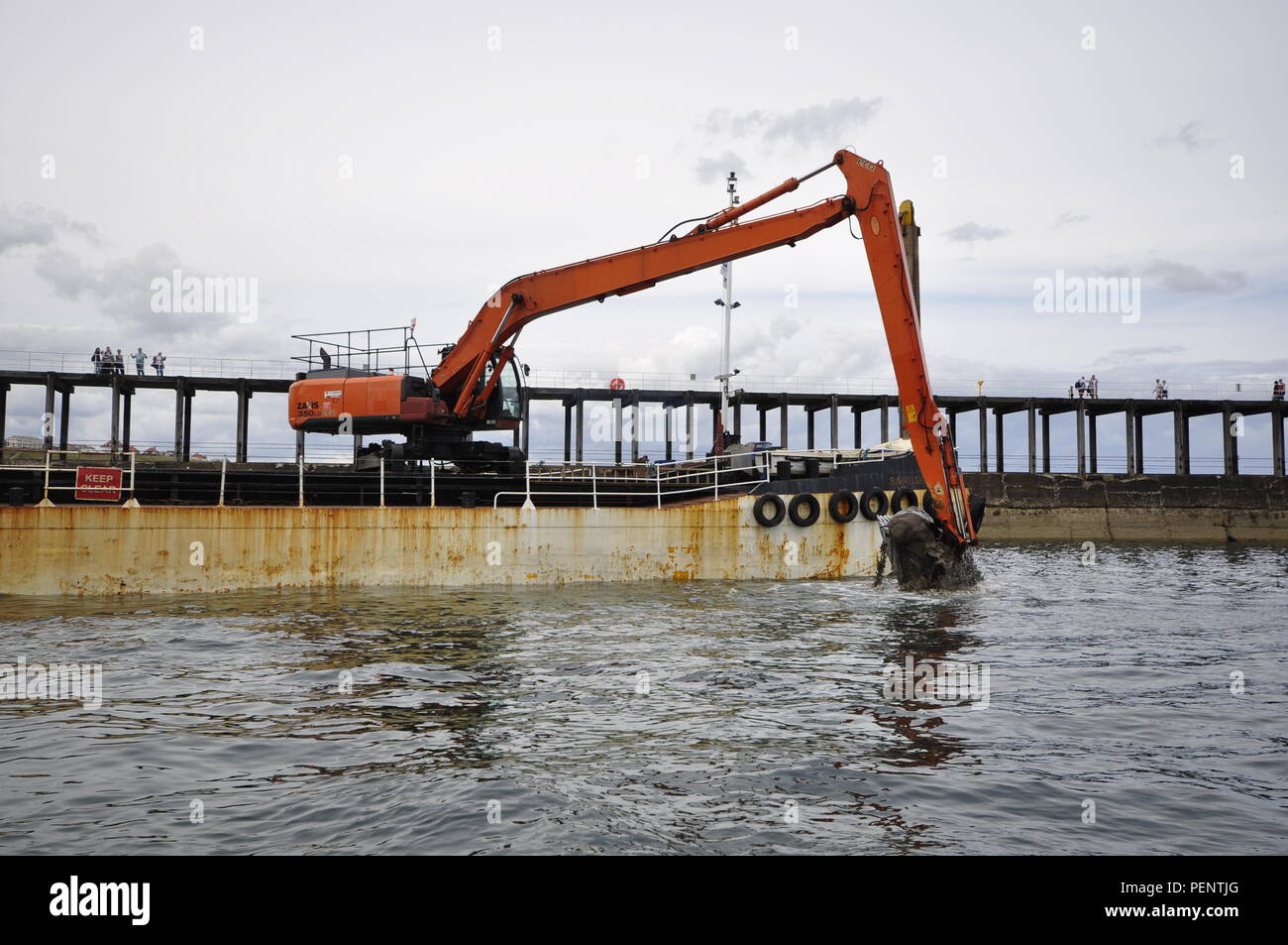 The dredger, Sandsend, working in Whitby harbour, north Yorkshire ...