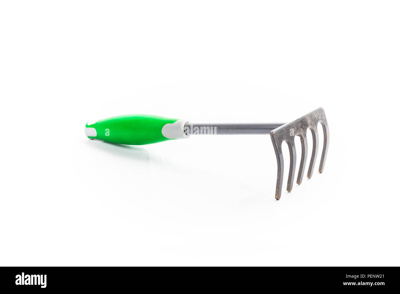small rake gardening 5 teeth with green handle on white background ...