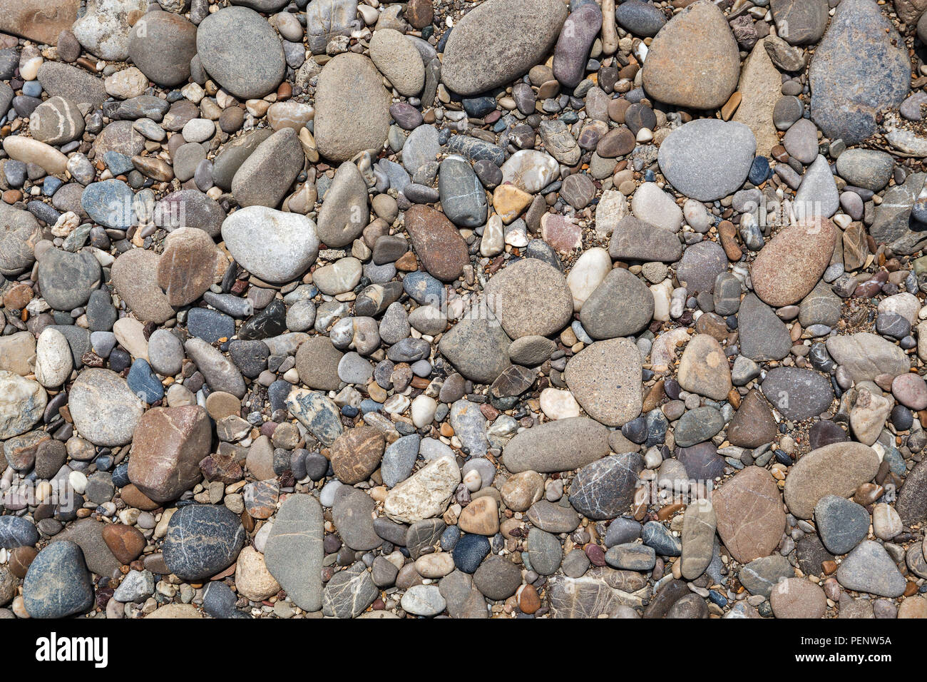 background made of a closeup of a pile of pebbles Stock Photo - Alamy