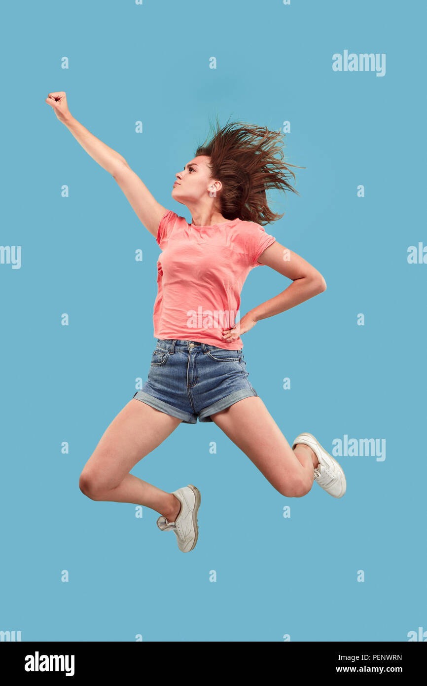 Freedom in moving. move only forward. pretty happy young woman jumping ...