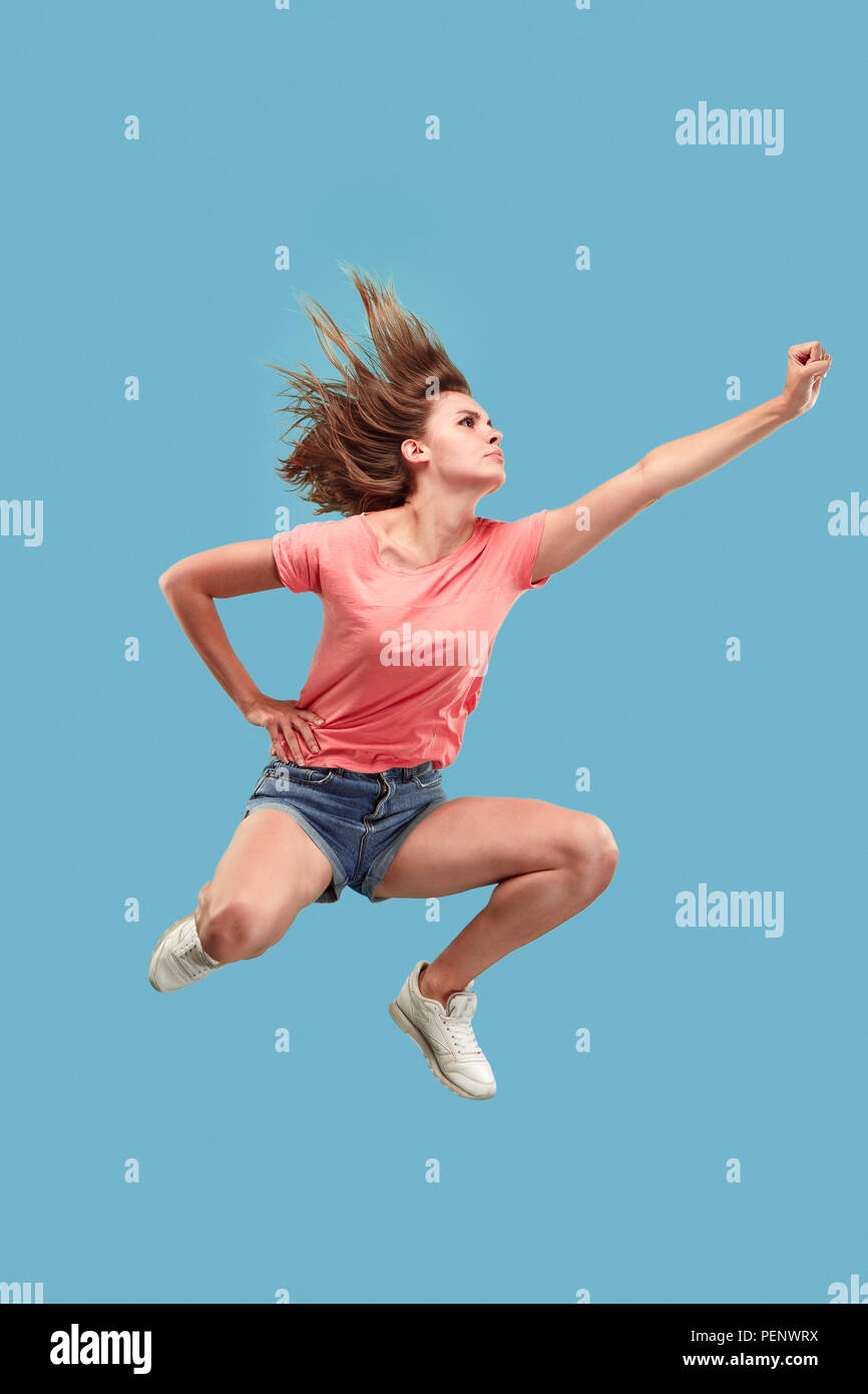 Freedom in moving. move only forward. pretty happy young woman jumping ...