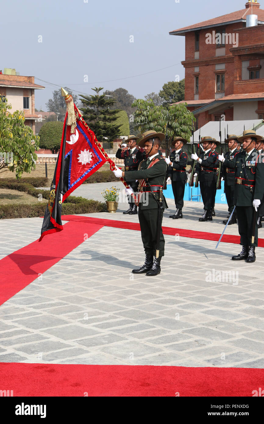 An honor guard of Nepalese soldiers stands assembled at their ...