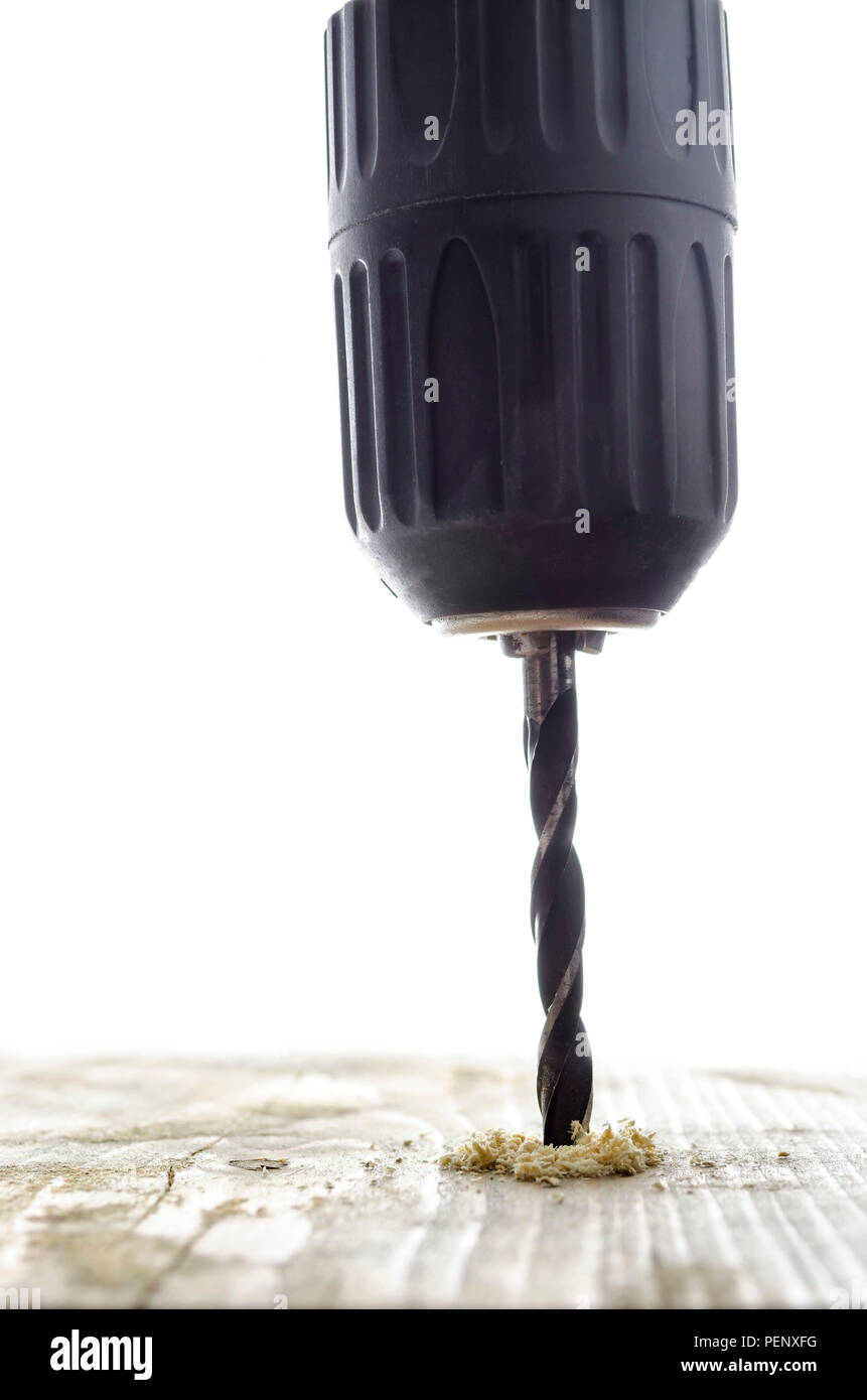 Side view of drilling in a wooden plank. With white background Stock ...