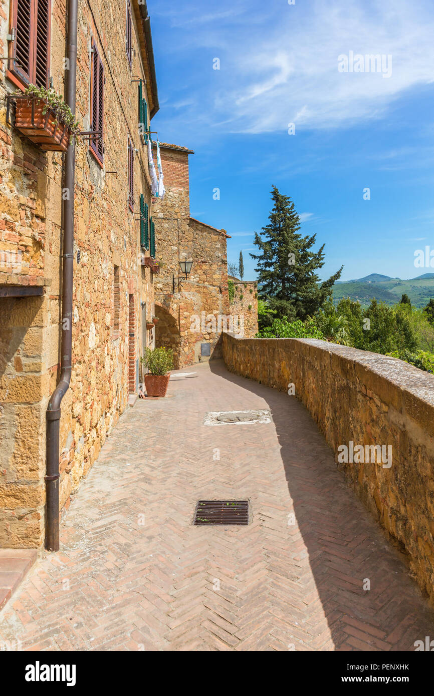 Walkway on a terrace at a residential building in an Italian village ...