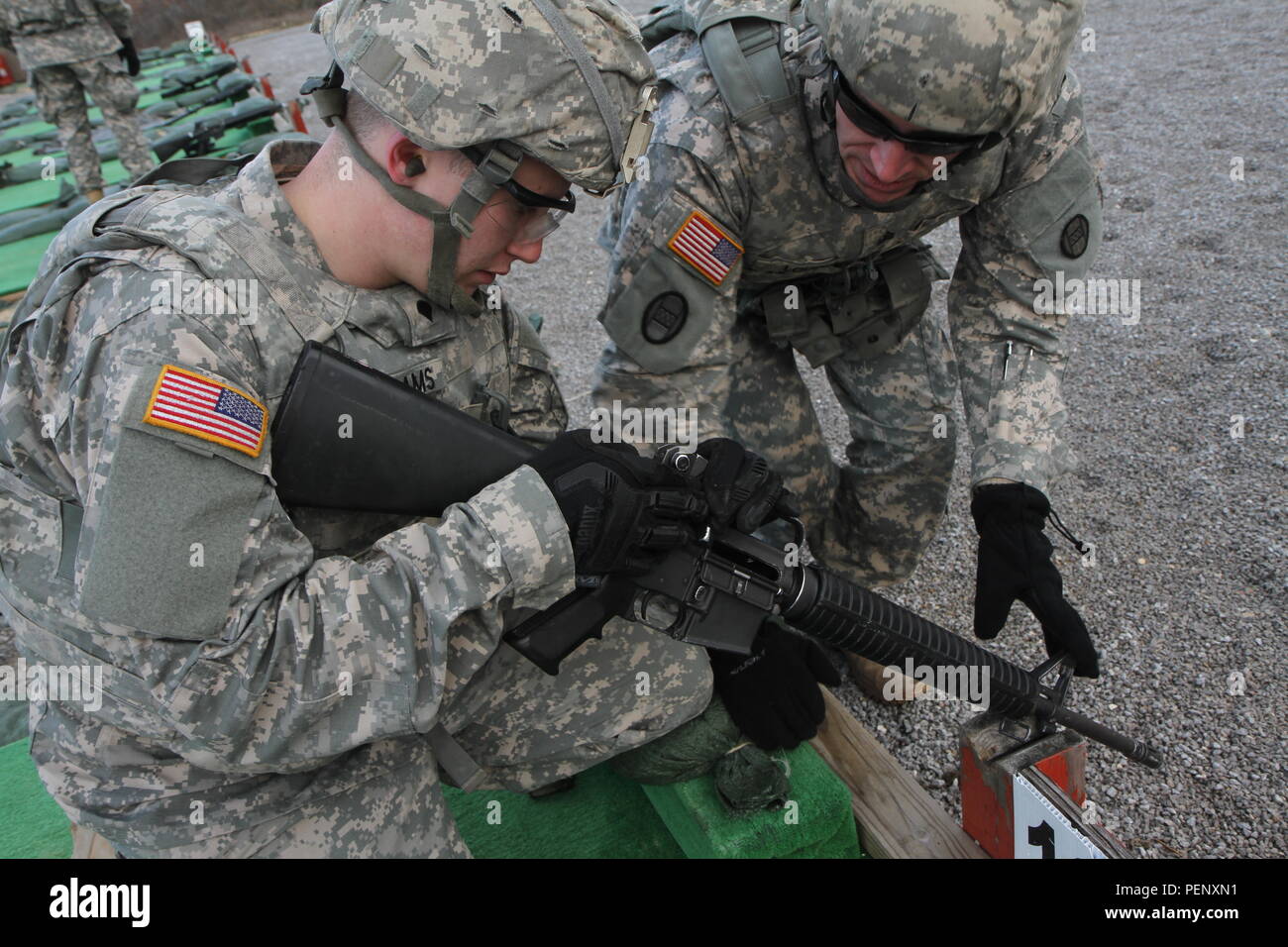 U.S. Army Spc. Travis Williams (left), a West Virginia National Guard ...