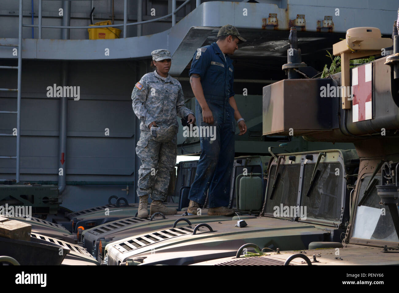 A Soldier (left) from 2nd Battalion, 27th Infantry Regiment, 3rd ...