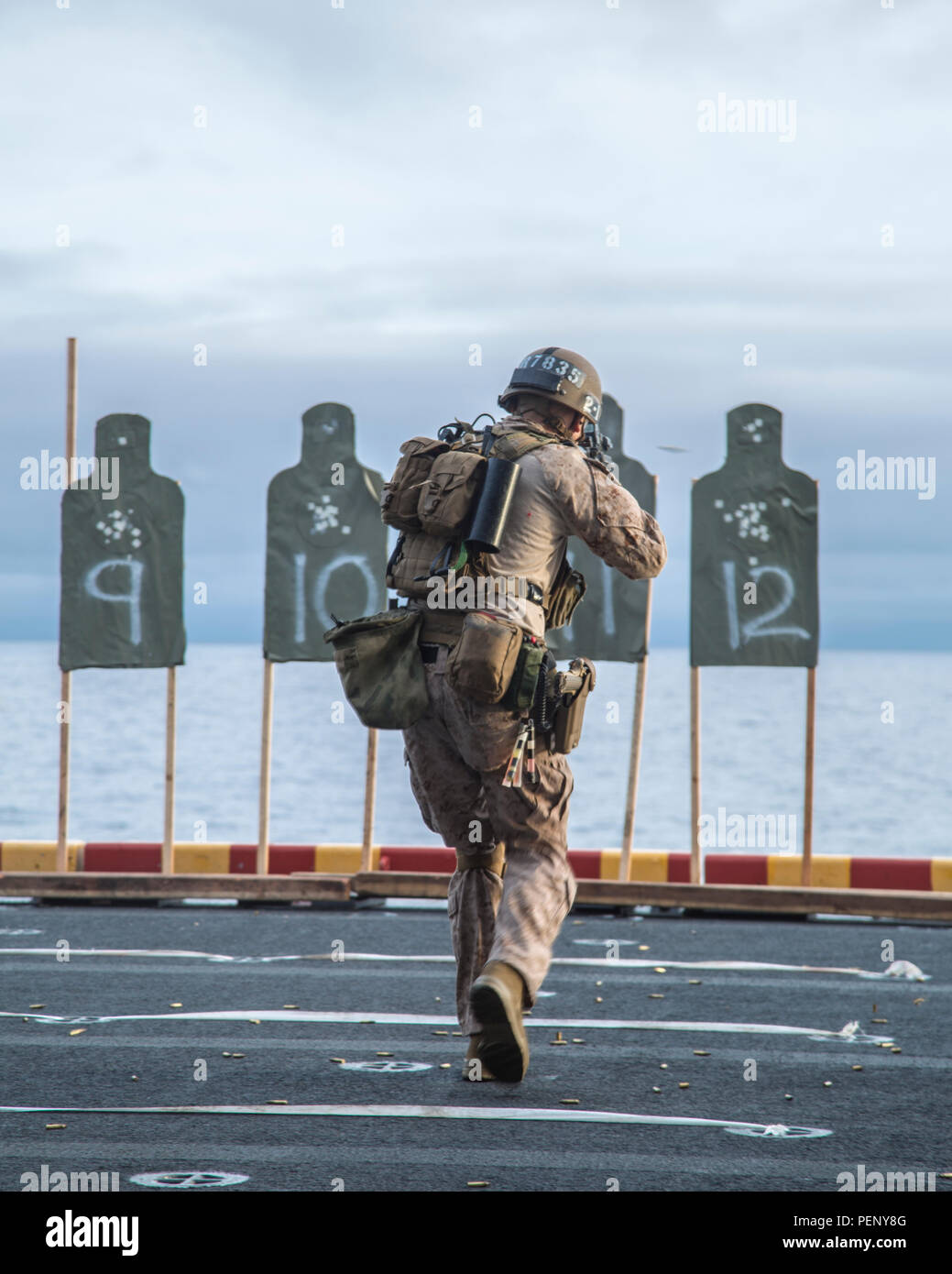 A U.S. Marine with Maritime Raid Force, 13th Marine Expeditionary Unit ...