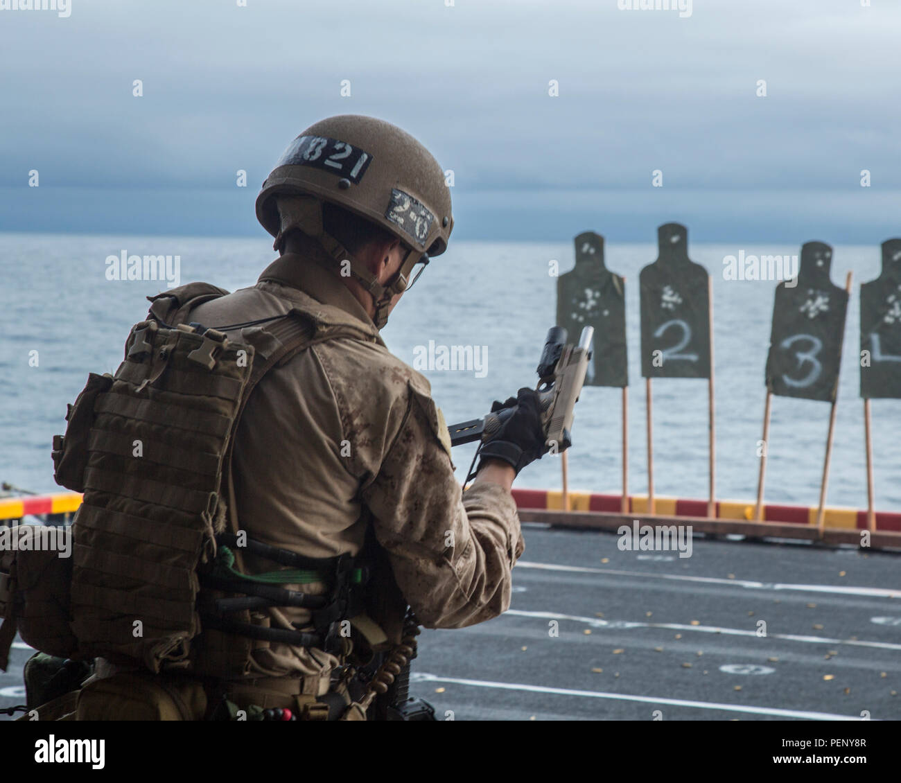 A U.S. Marine with Maritime Raid Force, 13th Marine Expeditionary Unit ...