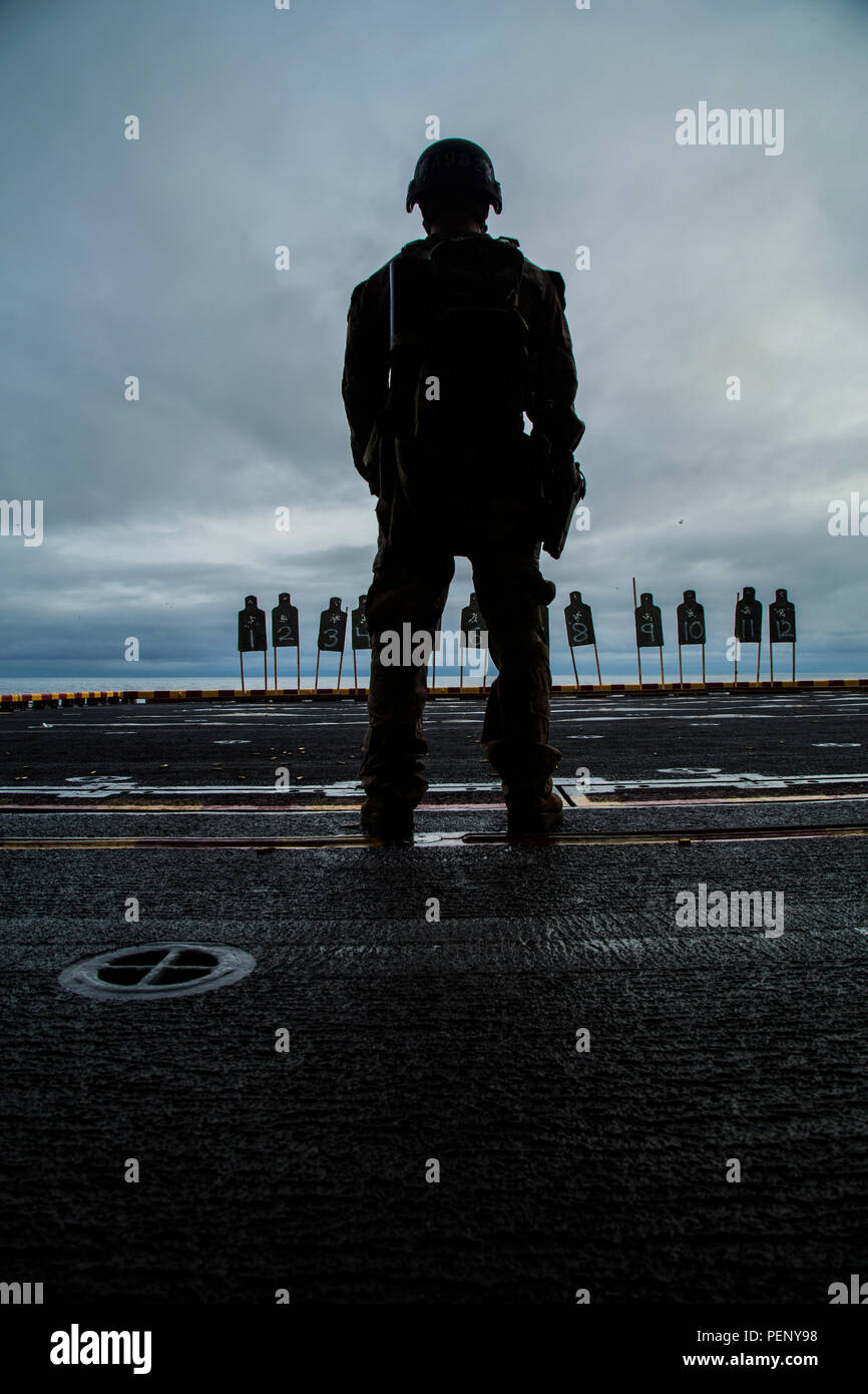 A U.S. Marine with Maritime Raid Force, 13th Marine Expeditionary Unit ...