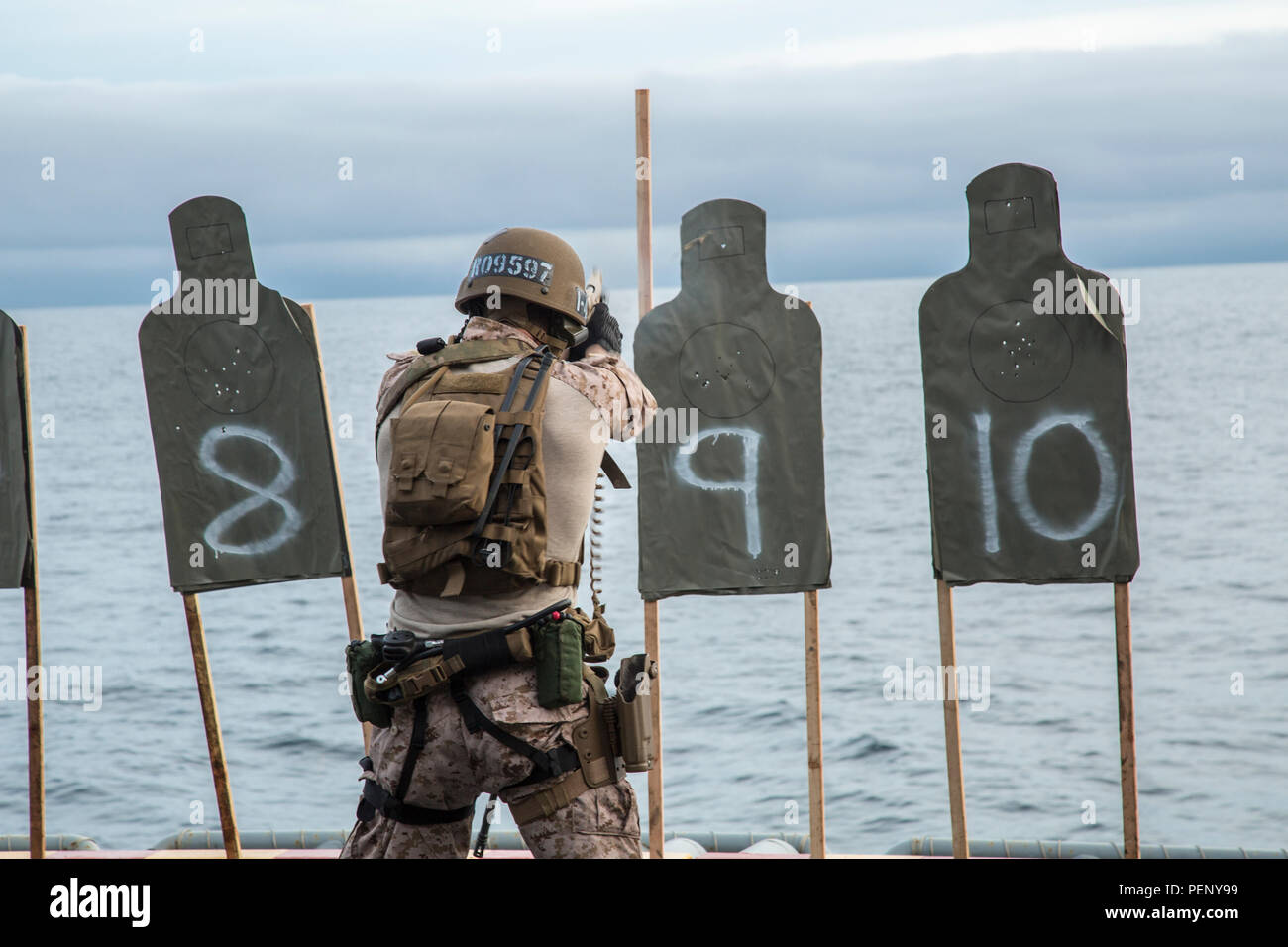 A U.S. Marine with Maritime Raid Force, 13th Marine Expeditionary Unit ...