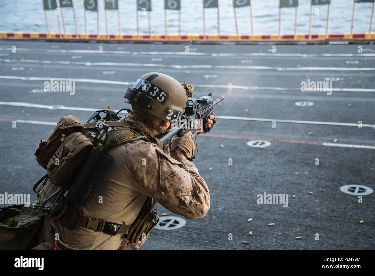 A U.S. Marine with Maritime Raid Force, 13th Marine Expeditionary Unit ...