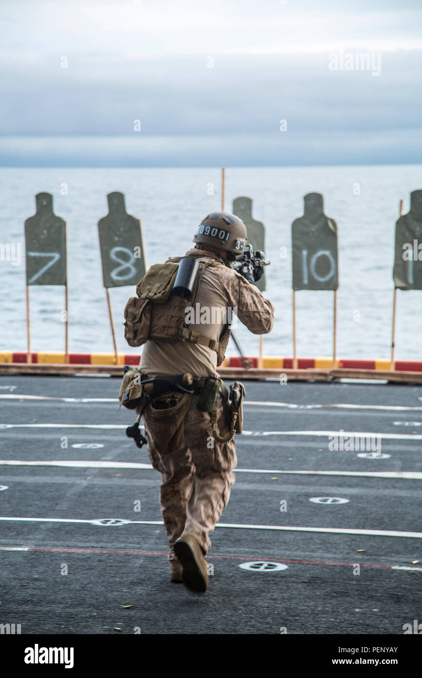 A U.S. Marine with Maritime Raid Force, 13th Marine Expeditionary Unit ...