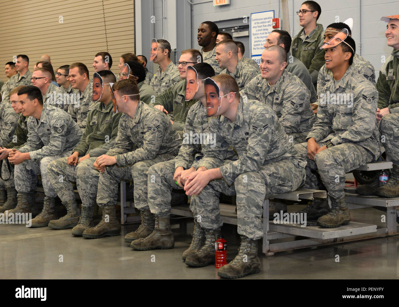Airmen show support for load crews during the fourth quarter weapons ...