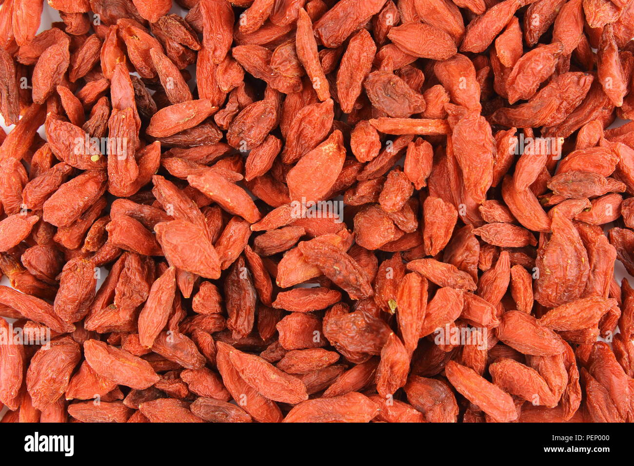 dried goji berries closeup as a food background texture Stock Photo - Alamy