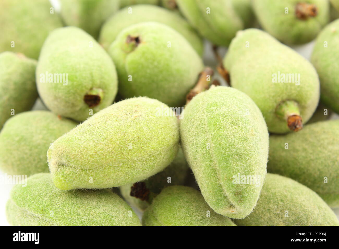 composition of fresh green almond fruits Stock Photo - Alamy