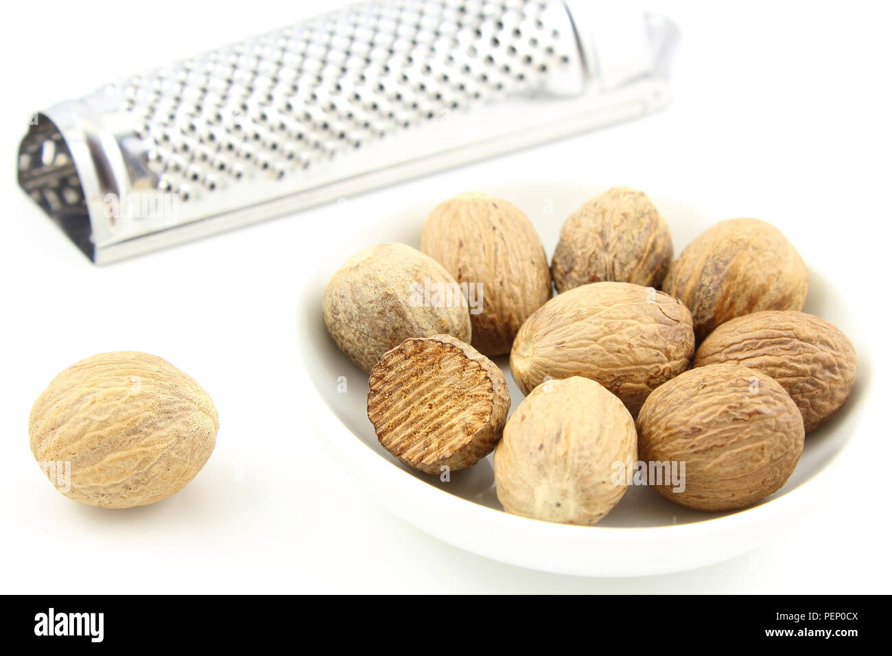 Nutmeg seeds isolated in hi-res stock photography and images - Alamy