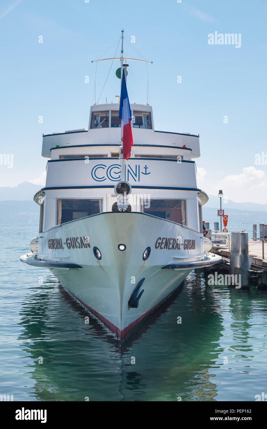 Modern CGN boat navigating between Swiss and French side of Lake Leman ...