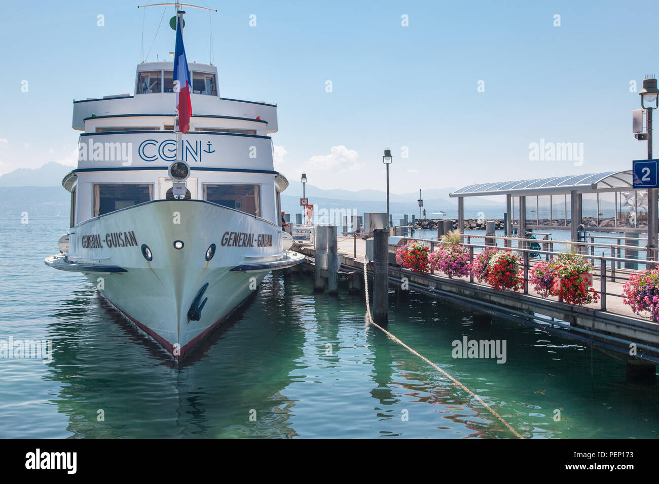 Modern CGN boat navigating between Swiss and French side of Lake Leman ...