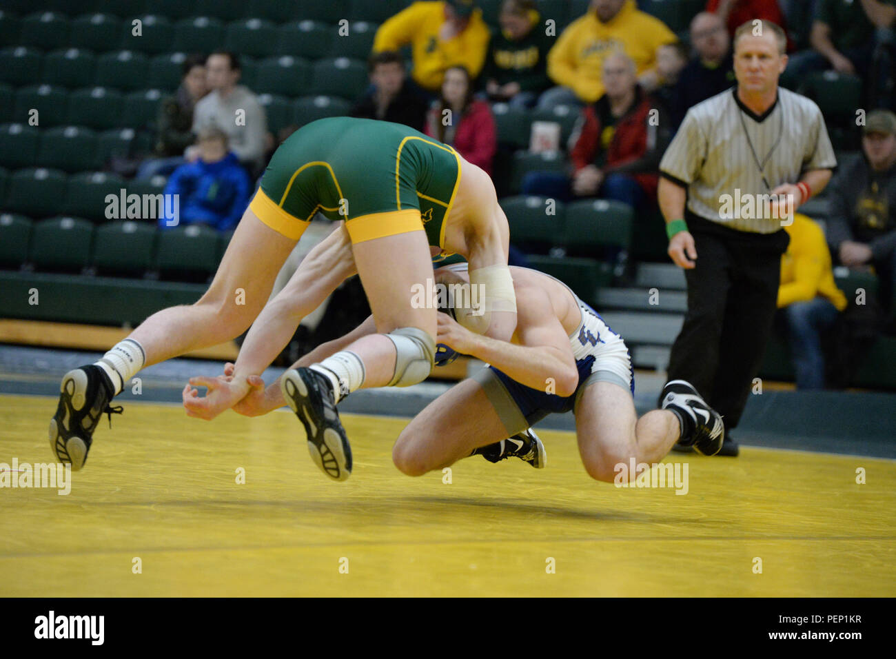 U.S. Air Force Academy cadet Dylan Hyder, in blue, and his opponent ...