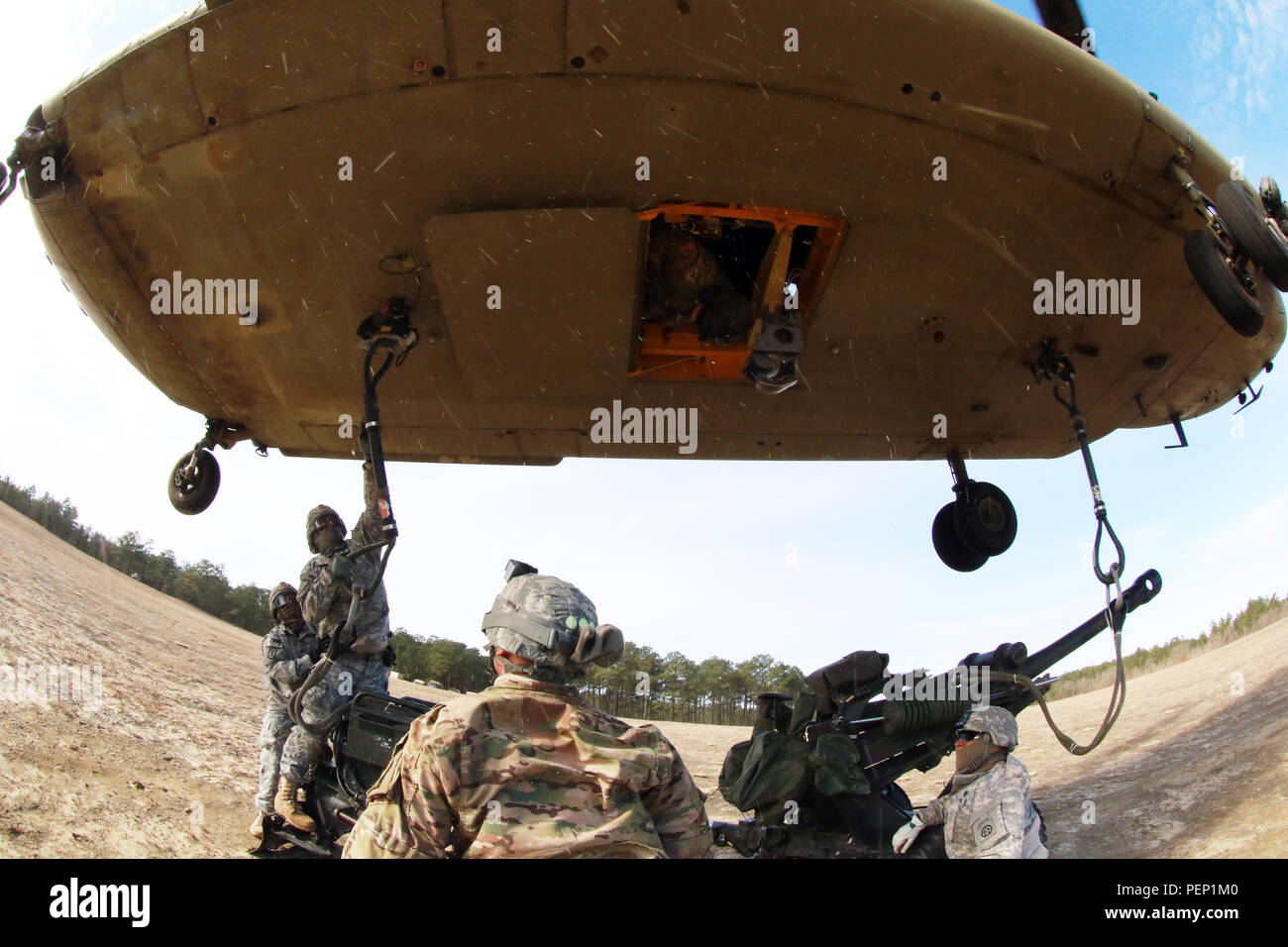 The second sling is hooked to a CH-47 Chinook assigned to the 82nd ...