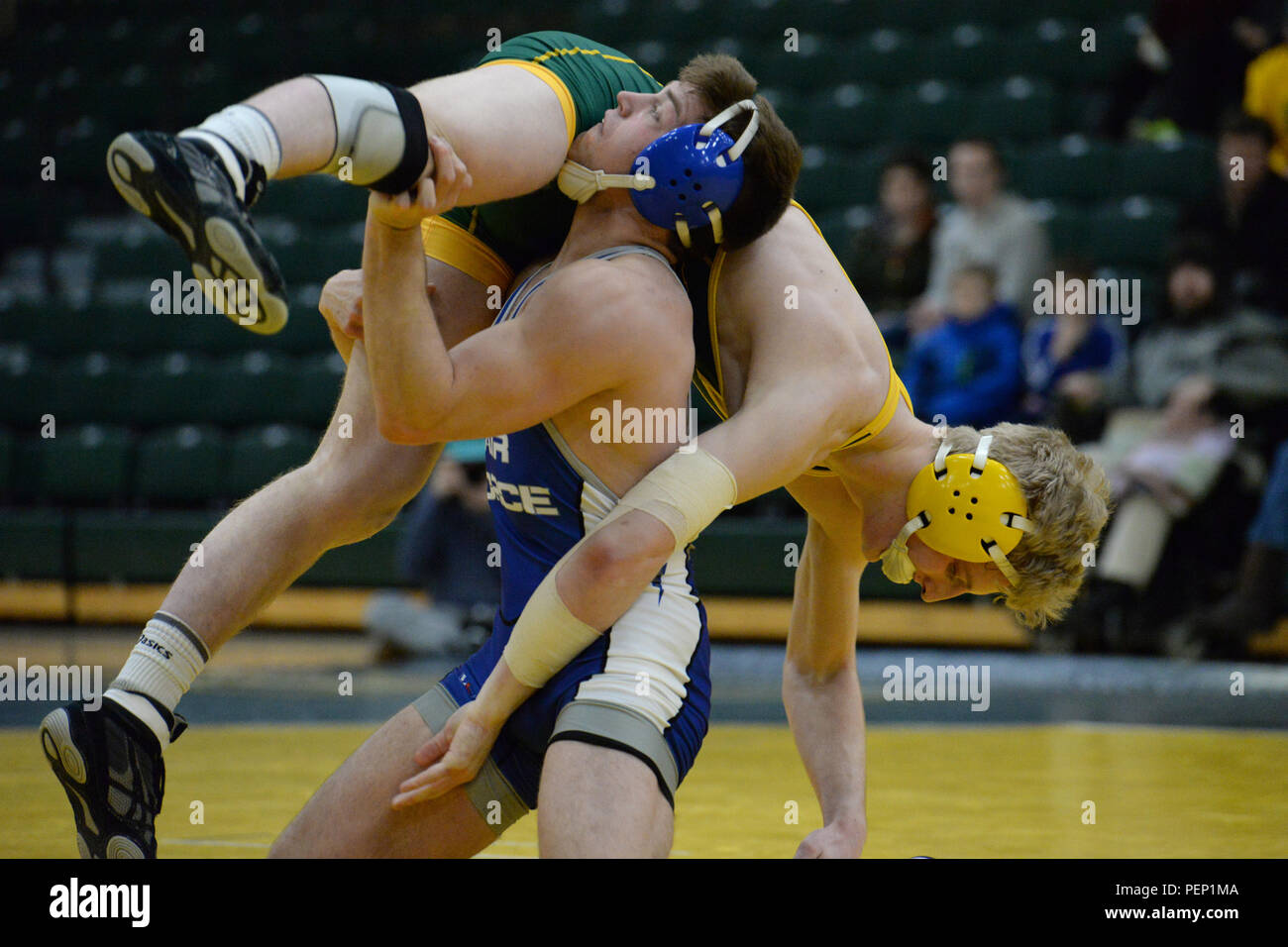U.S. Air Force Academy cadet Dylan Hyder, in blue, shoots in on the ...