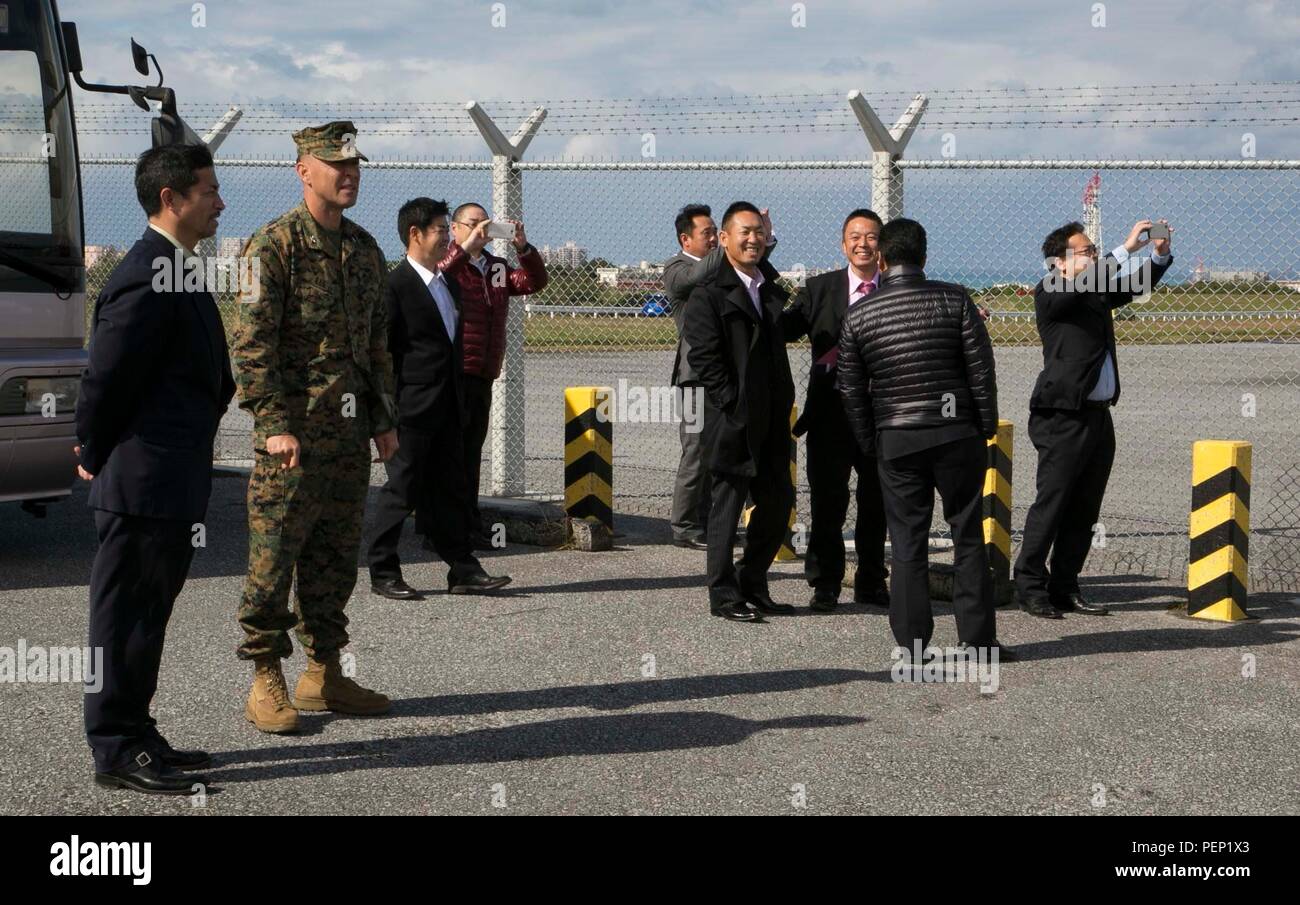 Col. Peter Lee, second from left, escorts members of the Liberal ...