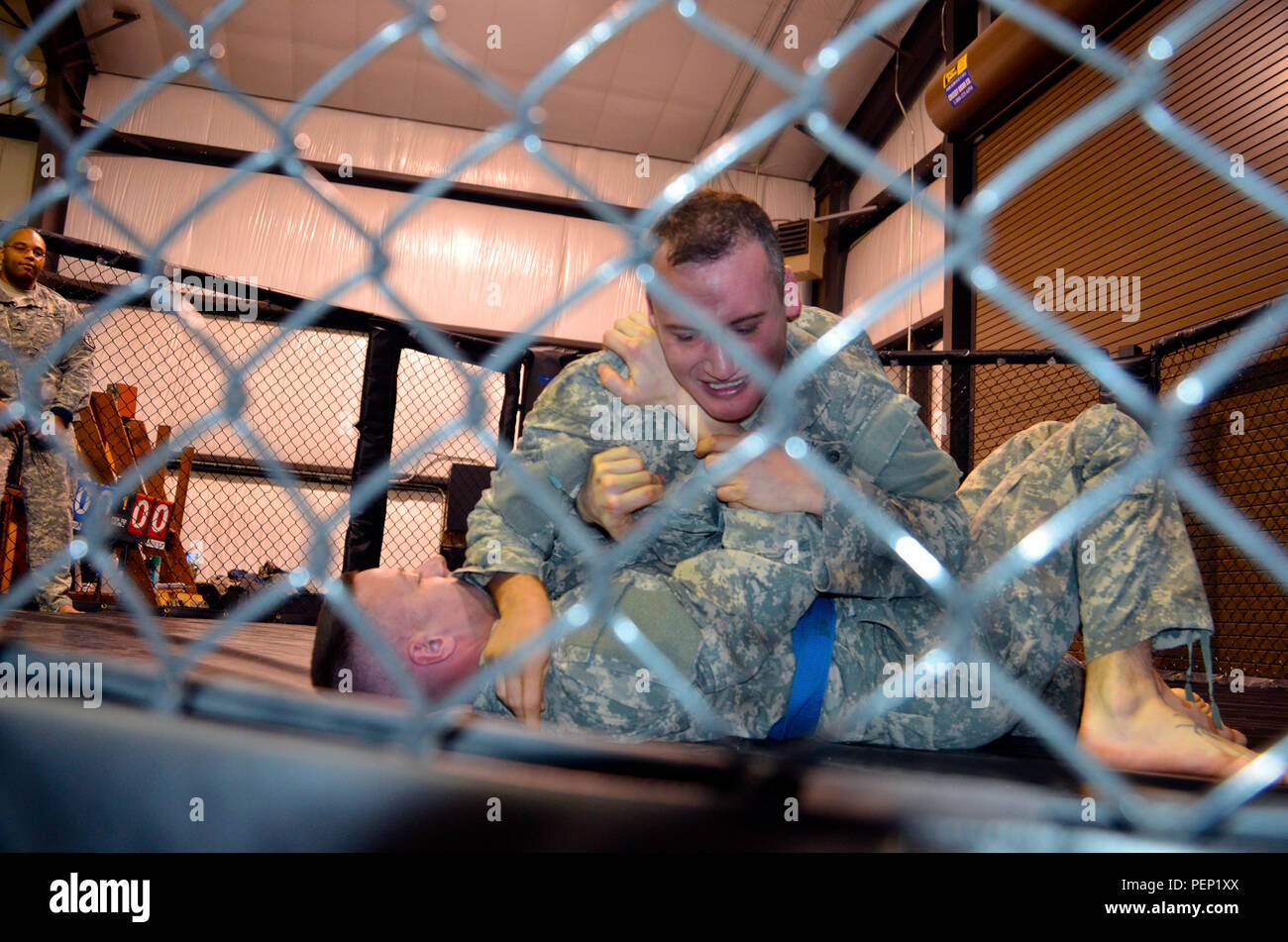 Soldiers from the 42nd Military Police Brigade attempt to lock in ...
