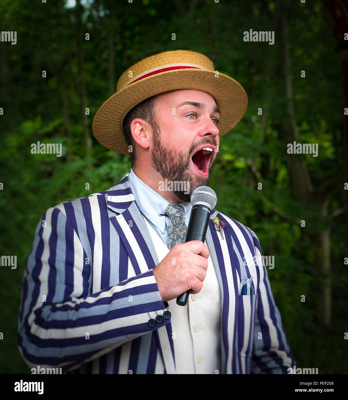 Professional singer, Pete Wayre, on the bandstand, entertaining the ...