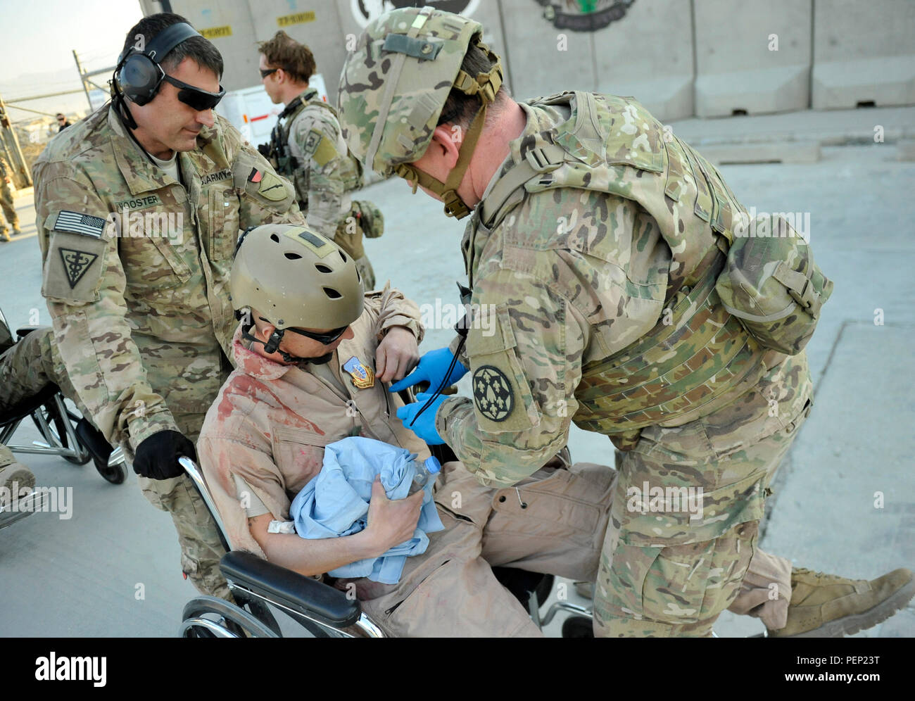 Army Master Sgt. Brian Breaker (right) and Sgt. Duncan Wooster (back ...
