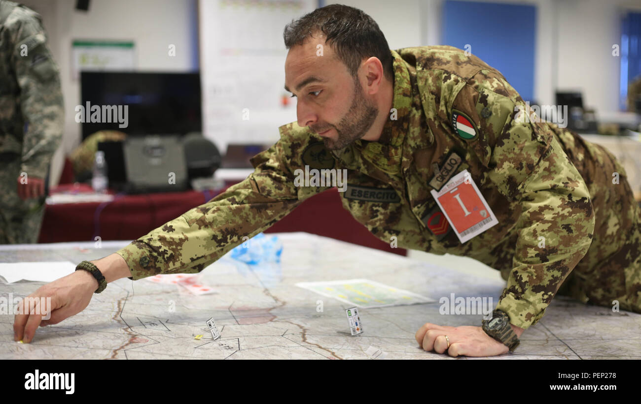 An Italian soldier of the Garibaldi Brigade plots an area of ...