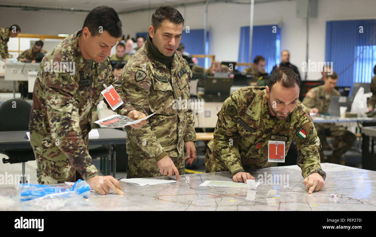 Italian soldiers of the Garibaldi Brigade plot areas of responsibility ...
