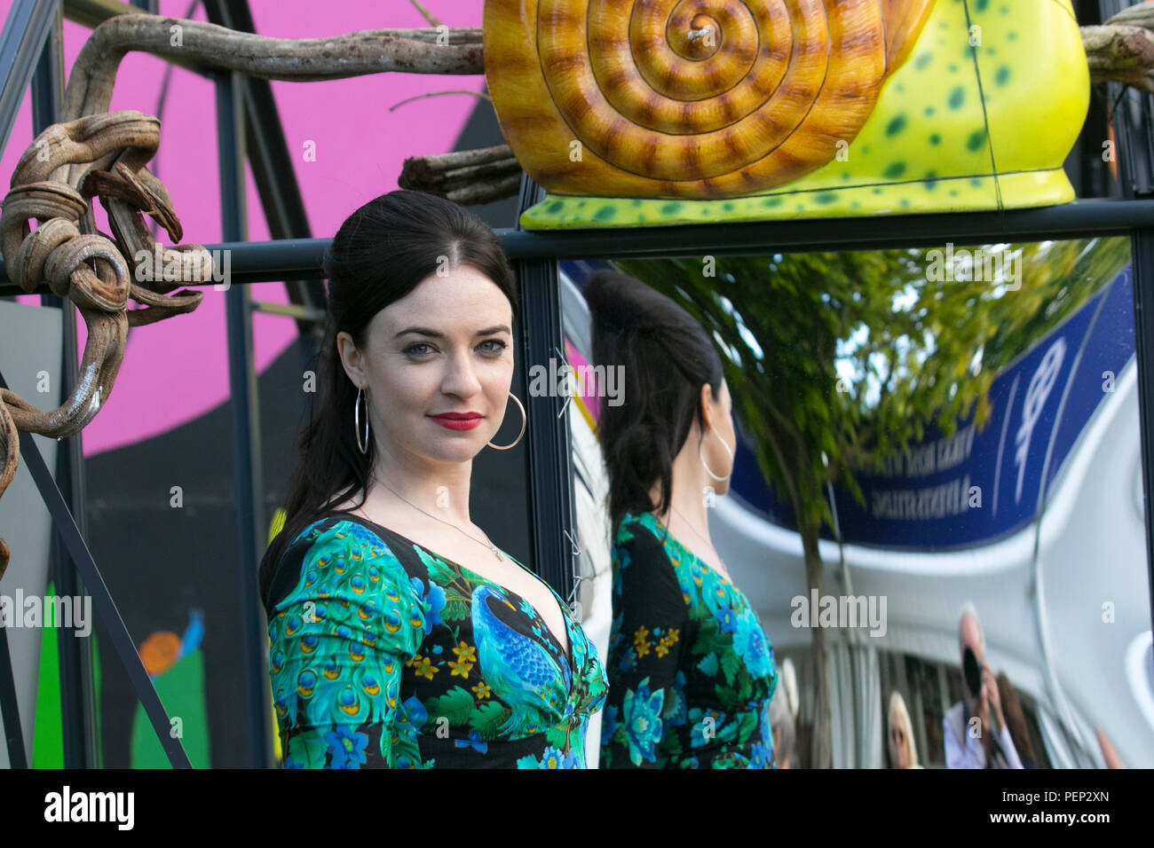 Distorted female images in funhouse curved Mirror in Southport ...