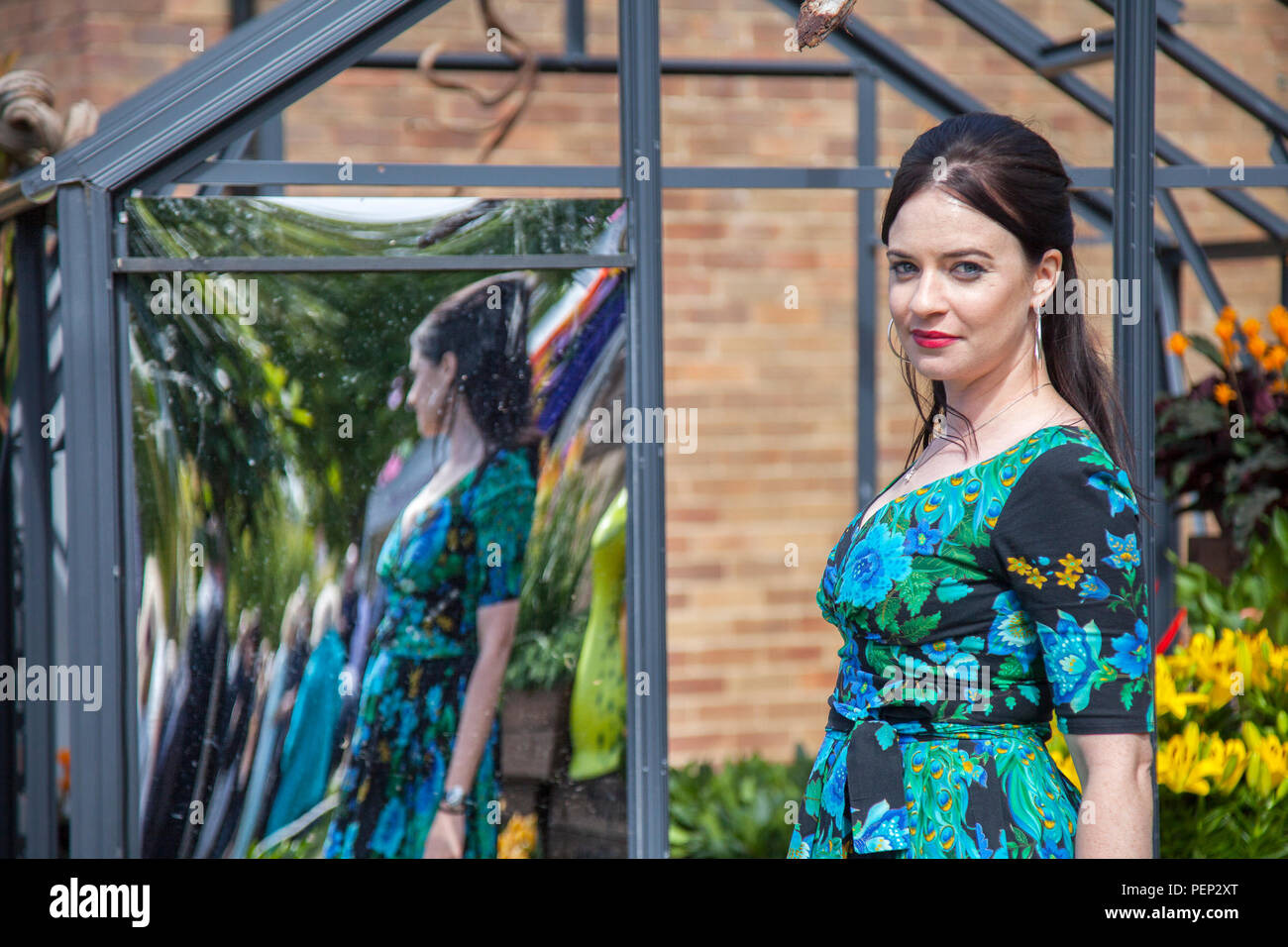 Distorted female images in funhouse curved Mirror in Southport ...