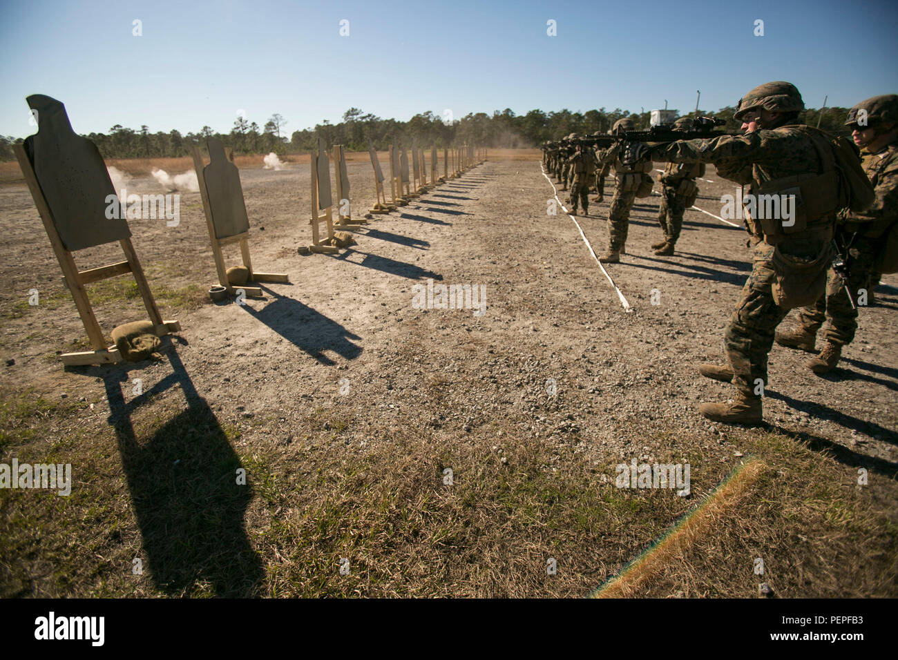 Marines with 2nd Combat Engineer Battalion engage targets during a ...