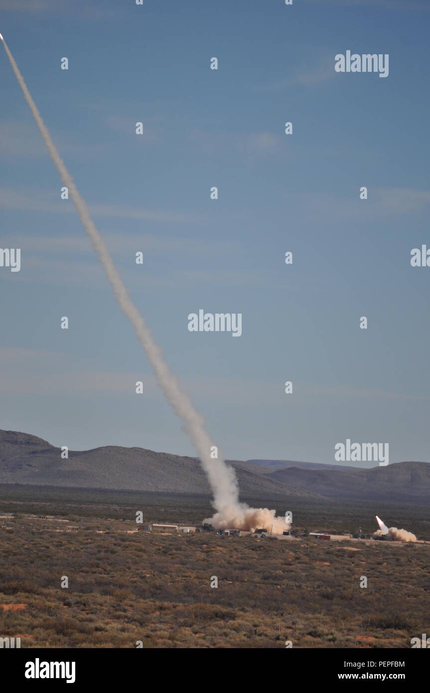 Two HAWK missiles launch into the air, aimed at aerial targets during a ...