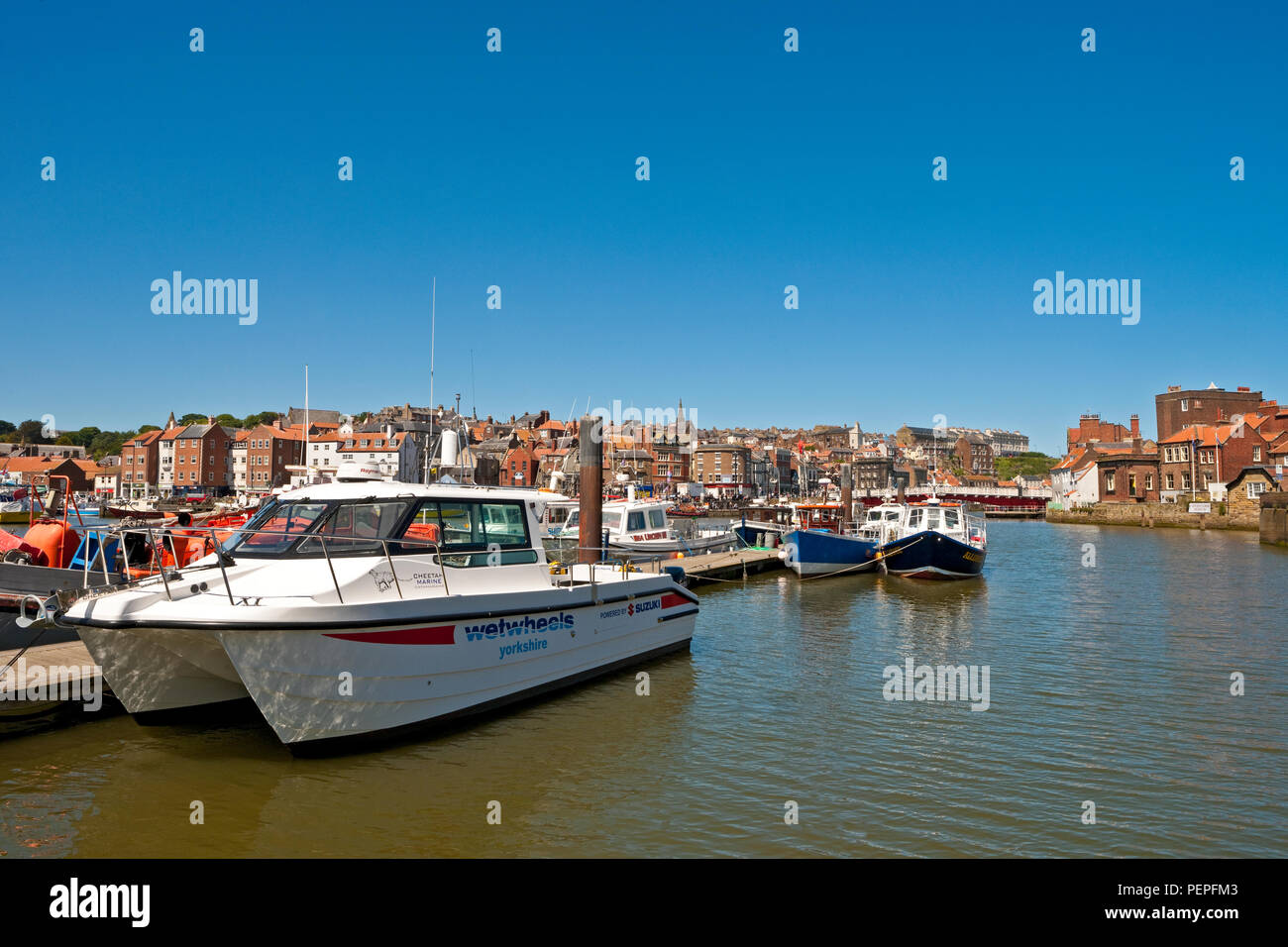 Wetwheels boat for disabled people moored in the harbour in summer ...