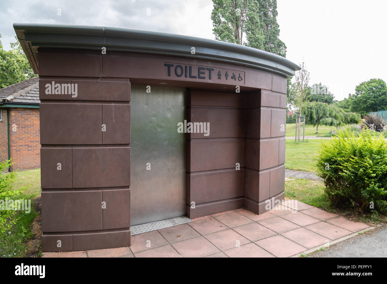 A coin-operated public toilet in Bellevue Park Wrexham Wales June 2018 ...