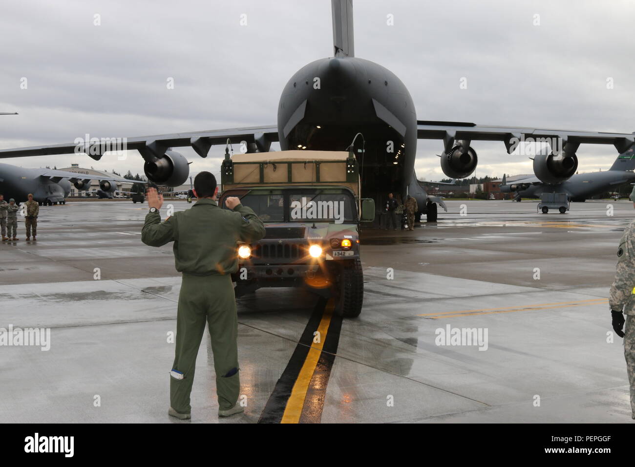 A Soldier from the I Corps Early Entry Command Post follows ...