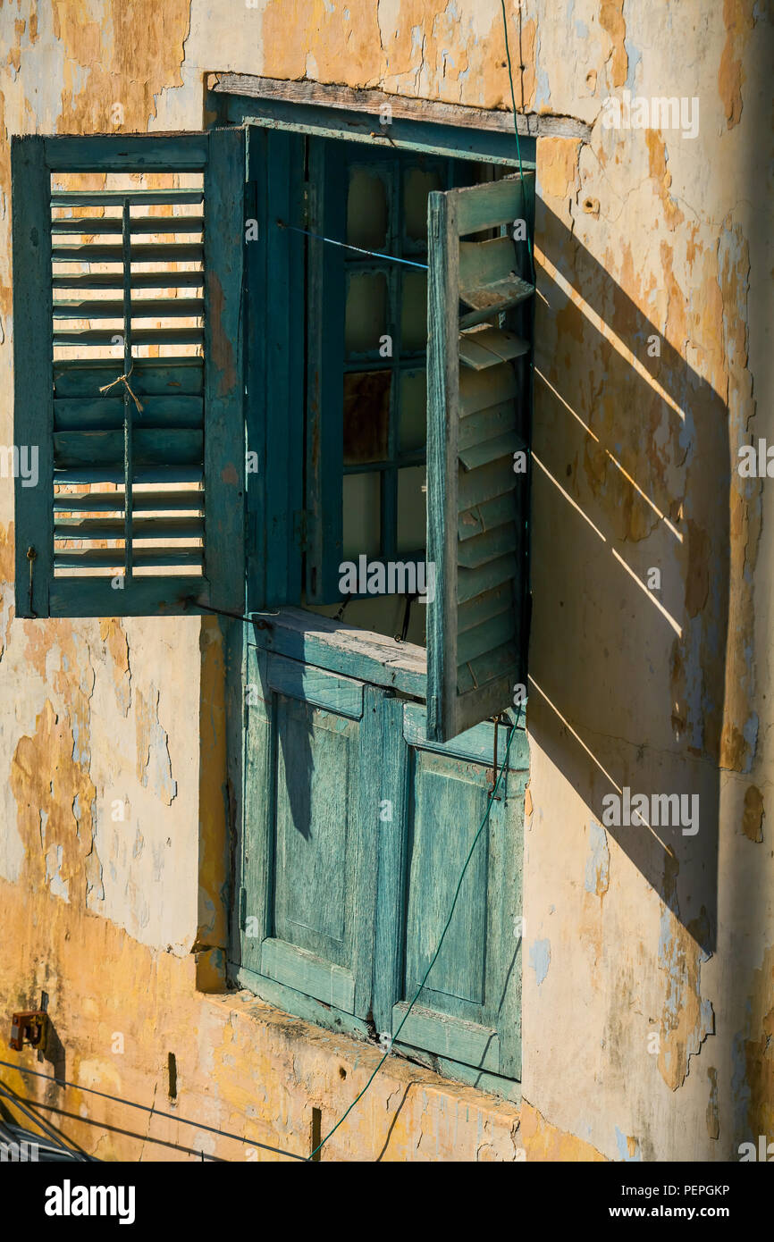 Old shuttered window with textured wall Stock Photo - Alamy