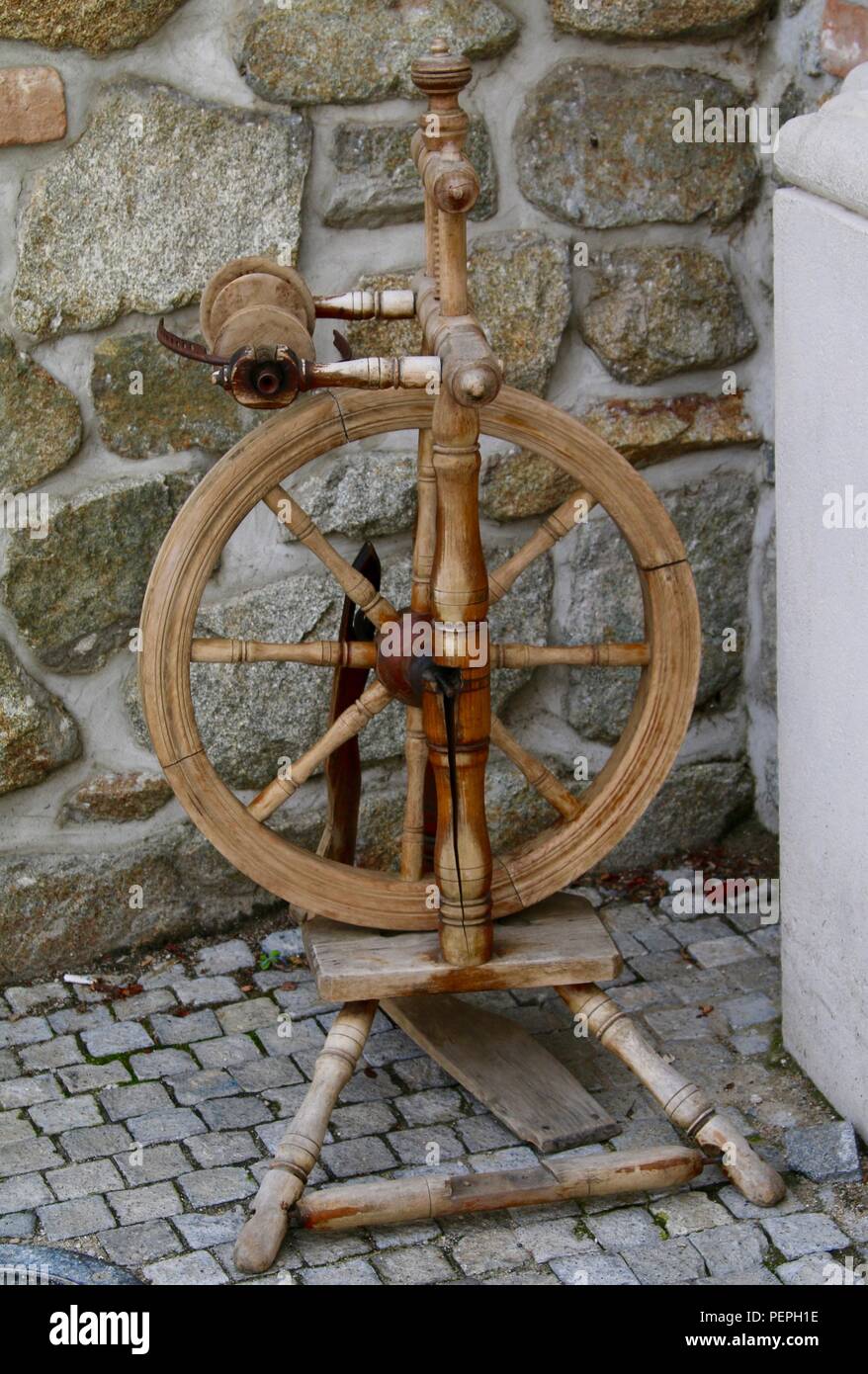 Wooden spinning wheel hi-res stock photography and images - Alamy