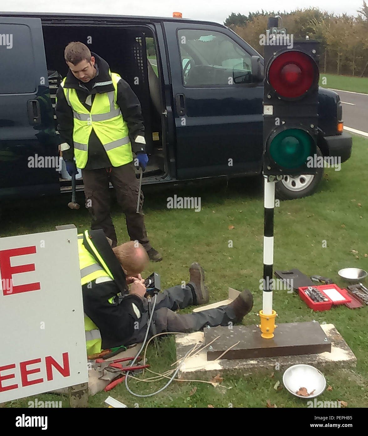 Members of the 100th Civil Engineer Squadron, connect the electrical ...
