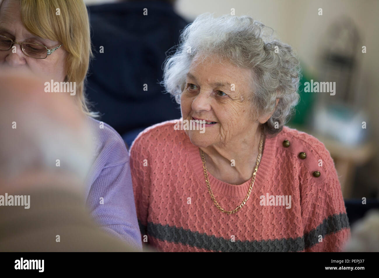 Lady cheeky smile hi-res stock photography and images - Alamy