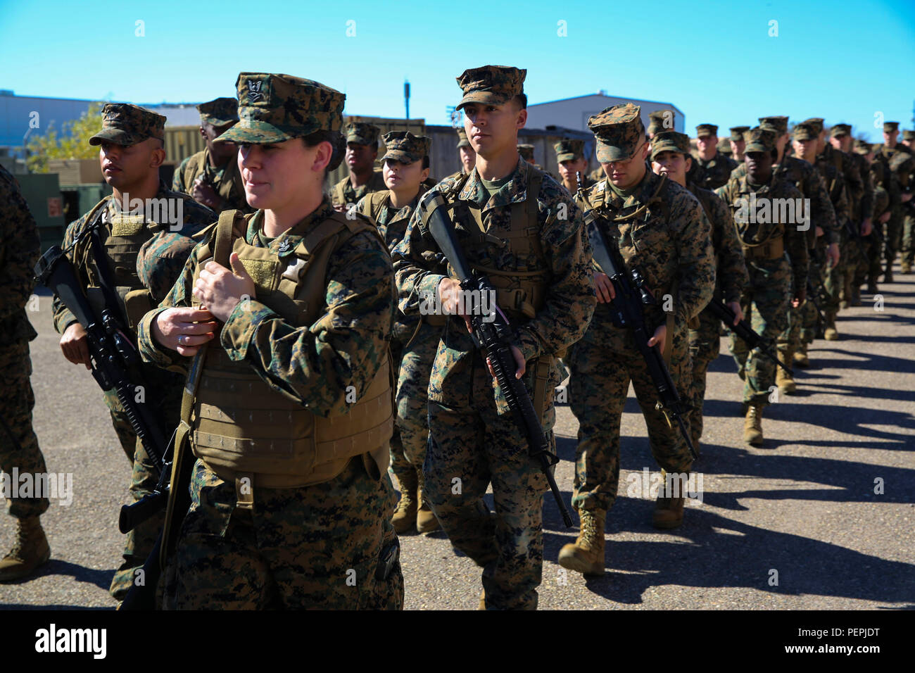 Service members with the Security Augmentation Force march to the ...