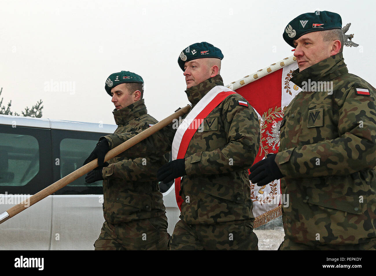 Soldiers of 12th Mechanized Brigade, Polish Army, march their colors ...