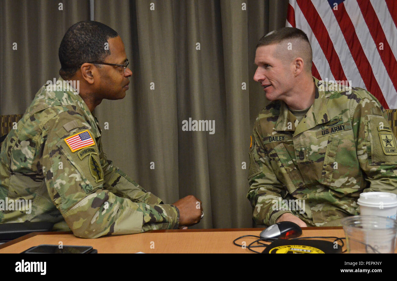 Sgt. Maj. of the Army Daniel Dailey talks with Command Sgt. Maj. James ...