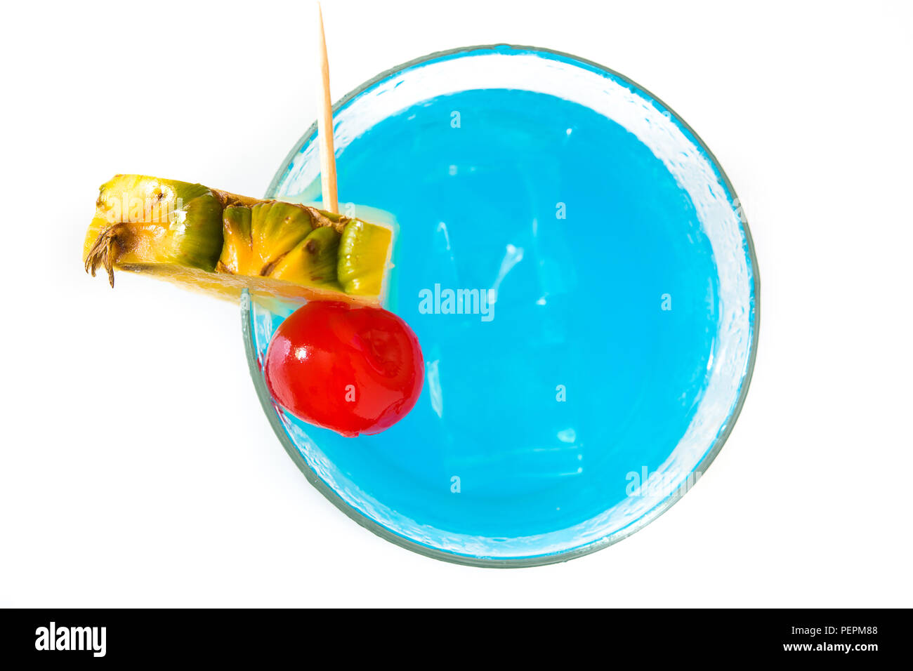 Blue Hawaiian cocktail on white background. Top view Stock Photo - Alamy