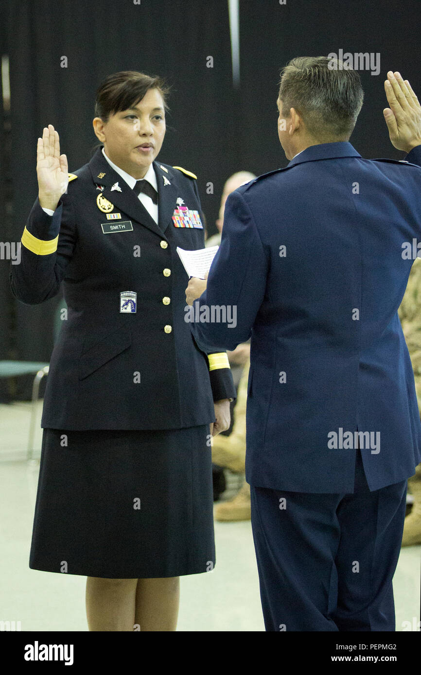 U.S. Air Force Audie Artero administers the Oath of Office to U.S. Army ...